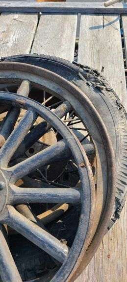 Group of Ford Model T tires and rims - Matthew Bullock Auctioneers