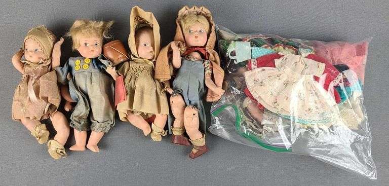 Group of composition dolls, clothing - Matthew Bullock Auctioneers