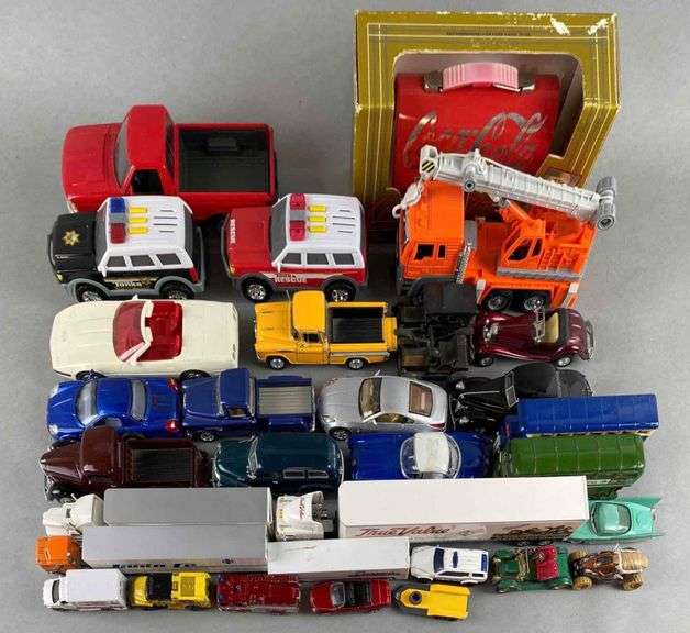 Group of 32 Die Cast and Plastic vehicles. - Matthew Bullock Auctioneers