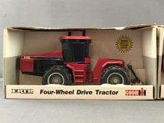Group of 2 Ertl Case International die-cast tractors - Matthew Bullock Auctioneers