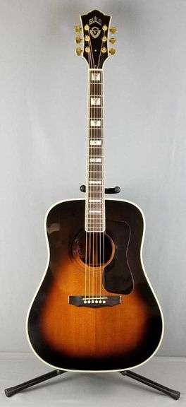 Guild Model D55 acoustic guitar with Case - Matthew Bullock Auctioneers