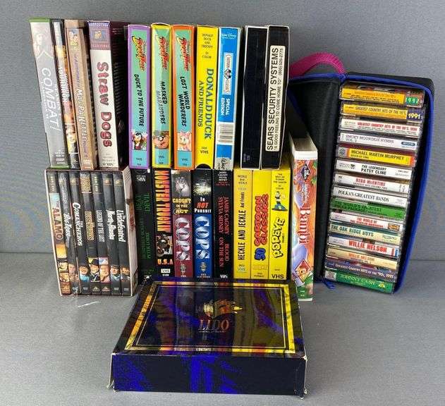 Group of DVDs, VHS and Cassette Tapes - Matthew Bullock Auctioneers