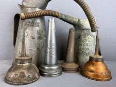 7 piece group of oil cans, spouts - Matthew Bullock Auctioneers