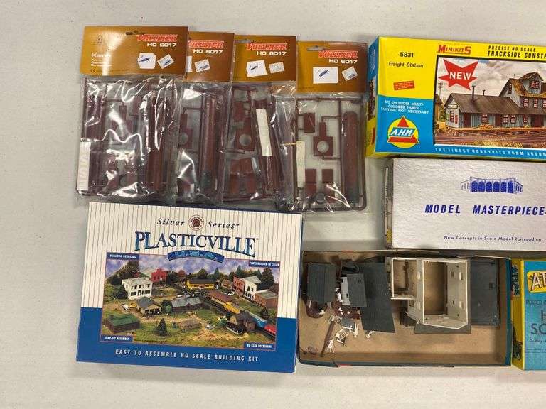 Group of 12 HO Scale Building Model Kits - Matthew Bullock Auctioneers
