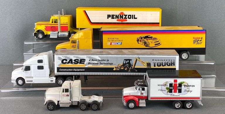Group of Die Cast Trucks with Trailers - Matthew Bullock Auctioneers
