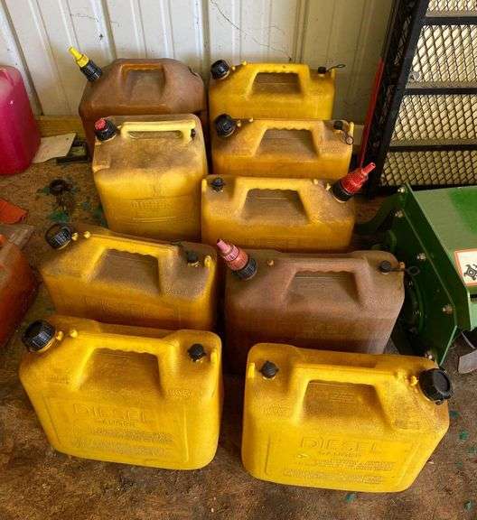 Group of 9 Yellow Wedco Diesel Cans - Matthew Bullock Auctioneers
