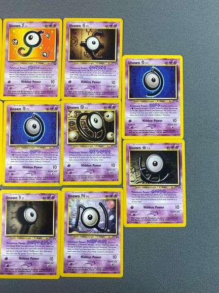 Group of 11 Pokemon Neo Discovery Unown Cards - Matthew Bullock Auctioneers