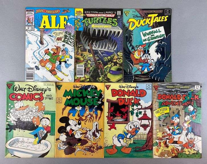 Group of 7 Disney Comic Books and More - Matthew Bullock Auctioneers