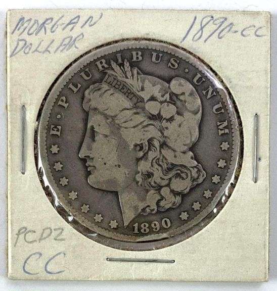 1890 CC Morgan Silver Dollar - Matthew Bullock Auctioneers
