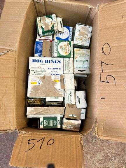 Large box of hog rings -with great adv boxes - McNatt Real Estate