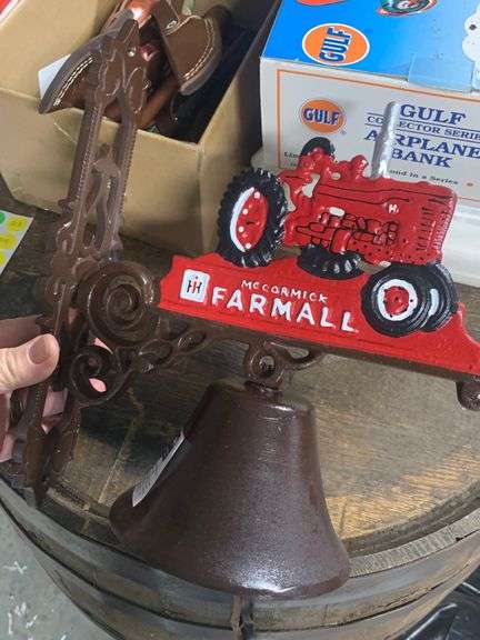 Gorgeous all cast iron Farmall tractor bell - McNatt Real Estate