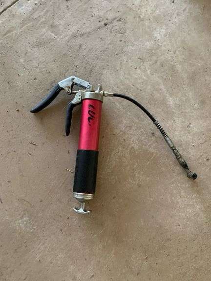 Grease gun - McNatt Real Estate