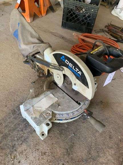 10" Delta Shopmaster compound mitre saw - McNatt Real Estate