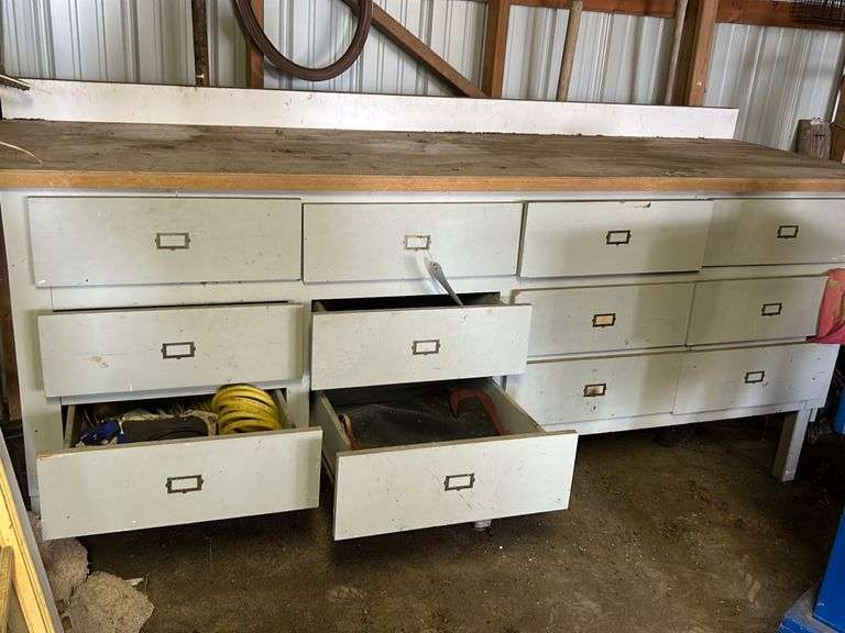 Nice Large work table with drawers and contents inside the drawers ...