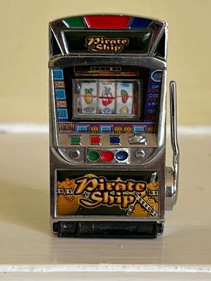 Neat Pirate ship slot machine lighter - McNatt Real Estate