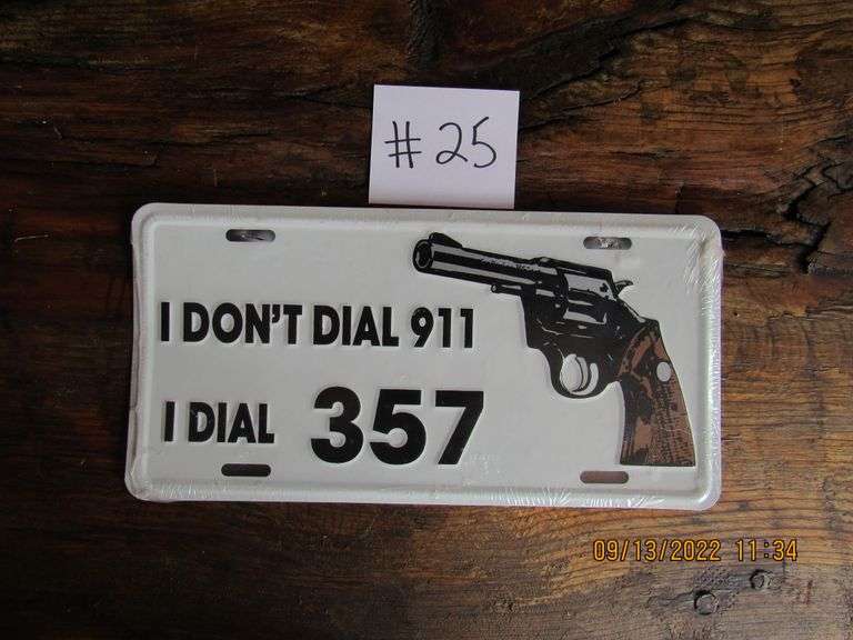 GUN SIGN - McPherson Auction & Realty