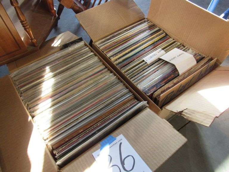 2 BOXES OF RECORDS - McPherson Auction & Realty