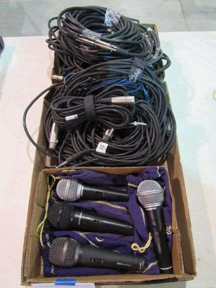 4 MICS AND 2 BOXES OF MIC CABLES - McPherson Auction & Realty