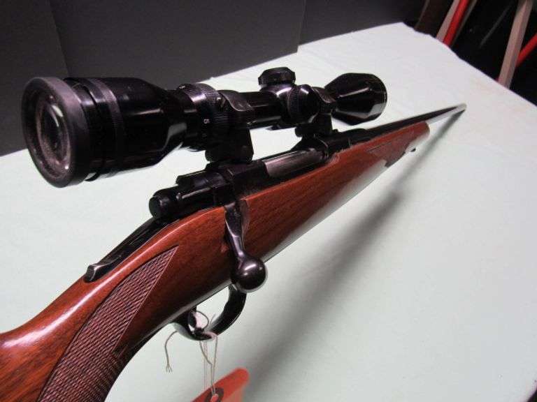 RUGER M77 25-06 S/N 770-26949, WOOD STOCK, TASCO 3X9X44 SCOPE ...