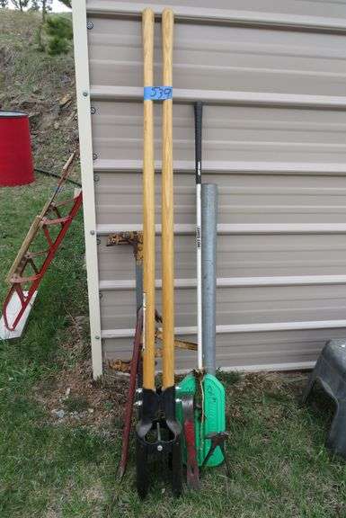 GROUP OF FENCING TOOLS, POST POUNDER, CLEAN OUT TOOL, AND WIRE ...
