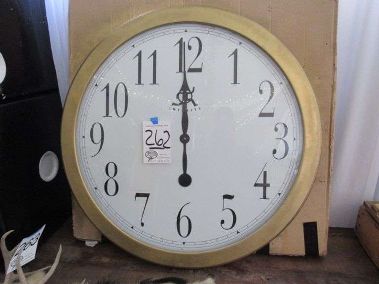 36 IN ROUND CLOCK - McPherson Auction & Realty