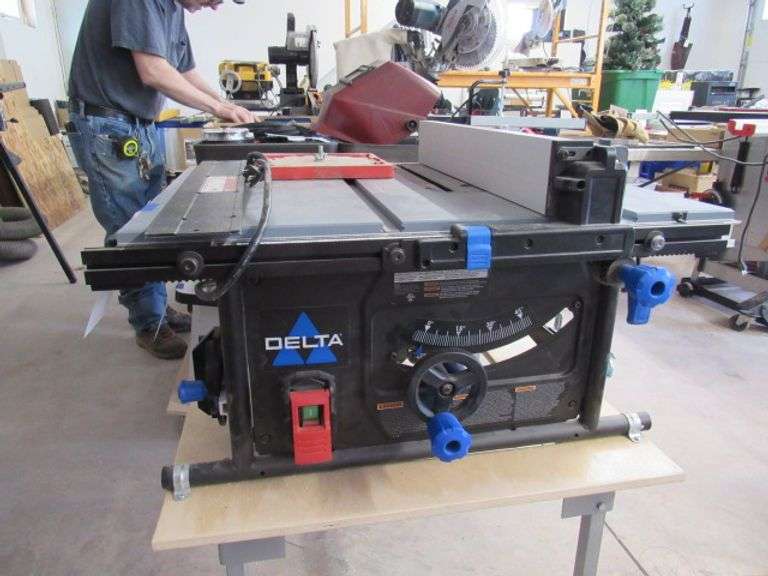 DELTA 10 IN TABLE SAW PORTABLE LIKE NEW - McPherson Auction & Realty