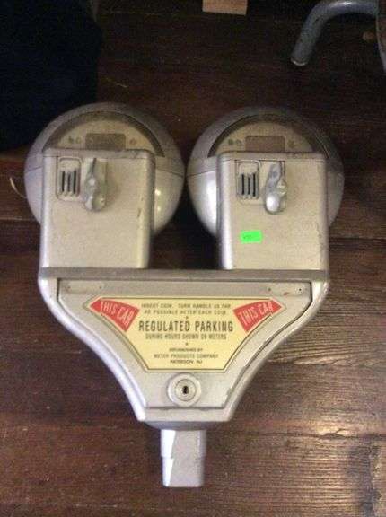 Parking meter head - Metzger Property Services, LLC