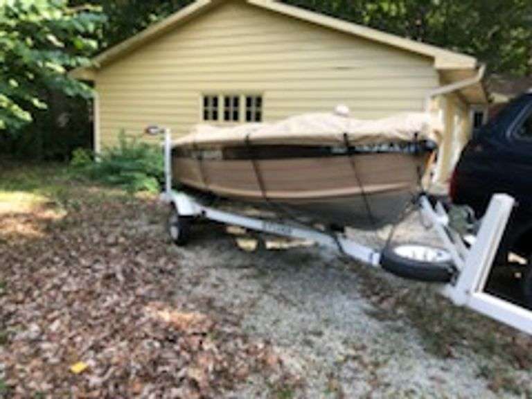 Super Snapper Boat W/evinrude Motor. Tiller handled with electric start ...