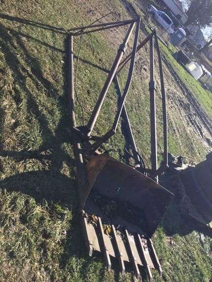 Trip bucket loader - Metzger Property Services LLC