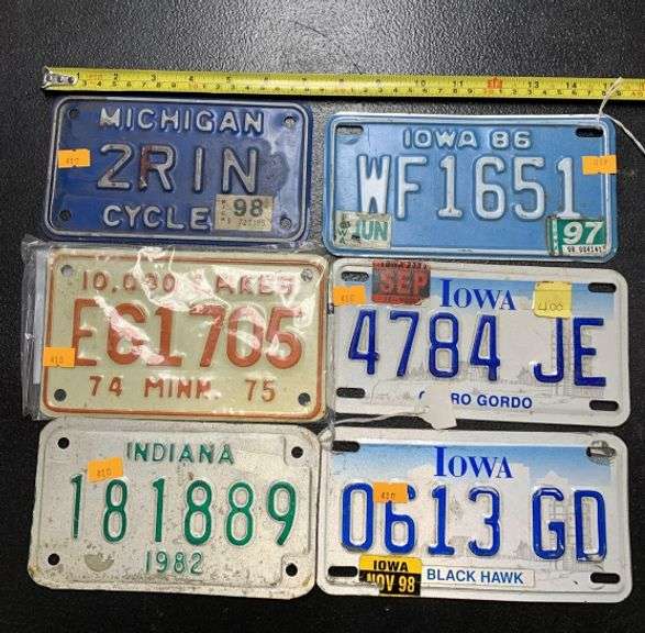 Assorted Motorcycle Plates - Metzger Property Services LLC