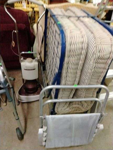 Rollaway cot, carpet scrubber, folding chair - Metzger Property ...