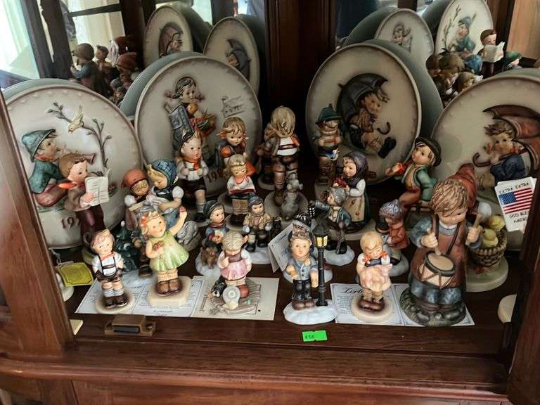 Goebel Hummel figurines and collector plates, contents of shelf ...