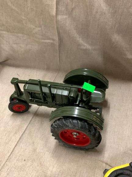 Massey Harris Challenger toy tractor - Metzger Property Services LLC