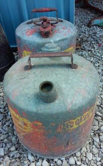 TWO 5 GALLON METAL GAS CANS - Metzger Property Services LLC
