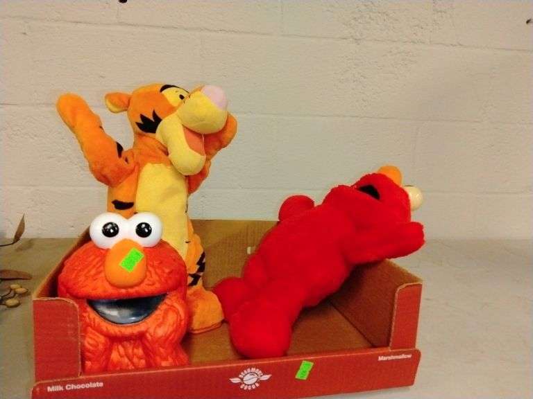 Elmo doll and bank, bouncing Tigger - Metzger Property Services LLC