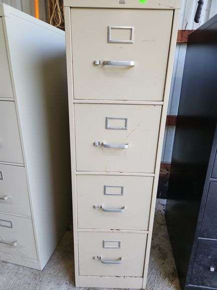 4-drawer metal file cabinet - Metzger Property Services LLC