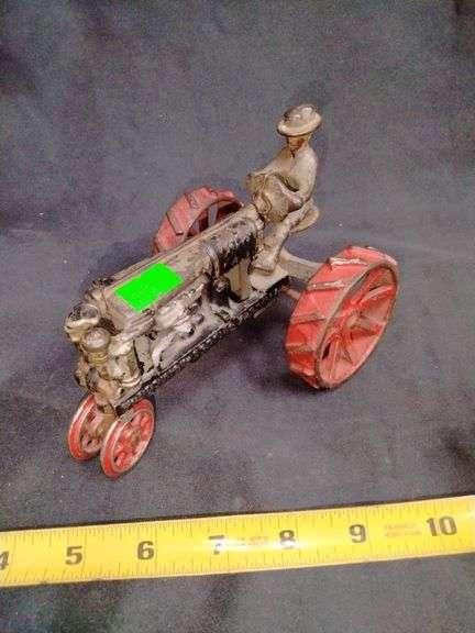 McCormicks Deering Farmall cast iron tractor - Metzger Property ...