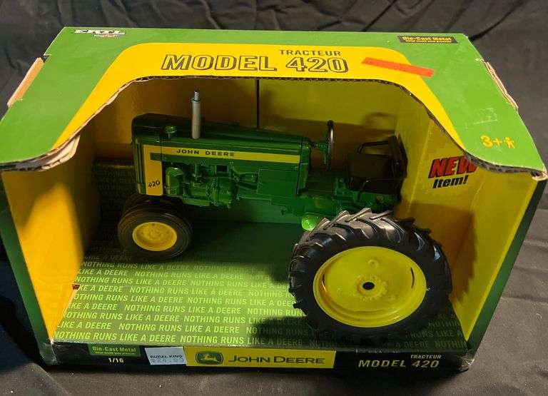 ERTL John Deere model 420 Toy tractor - Metzger Property Services LLC