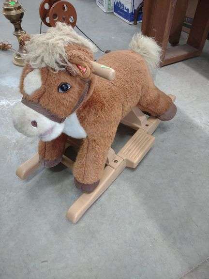 Child's plastic rocking horse - Metzger Property Services, LLC
