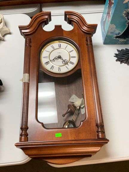 Howard Miller wall clock, battery operated, 24 in. H x 14 in. W x 5 in ...