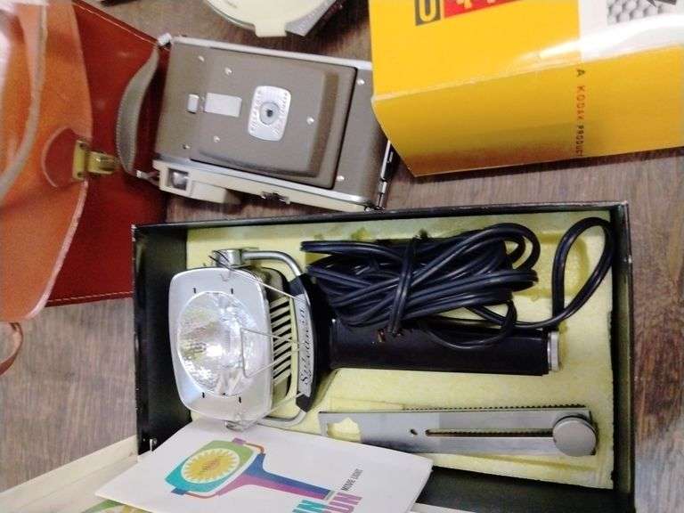 Kodak and Polaroid cameras and Sun Gun - Metzger Property Services LLC