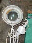 Adjustable clamp on fluorescent work light, paper cutter - Metzger ...