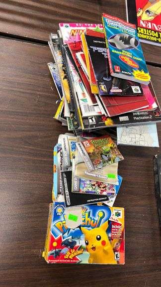 Assorted GameBoy advance instruction booklet, game shark pocket power ...