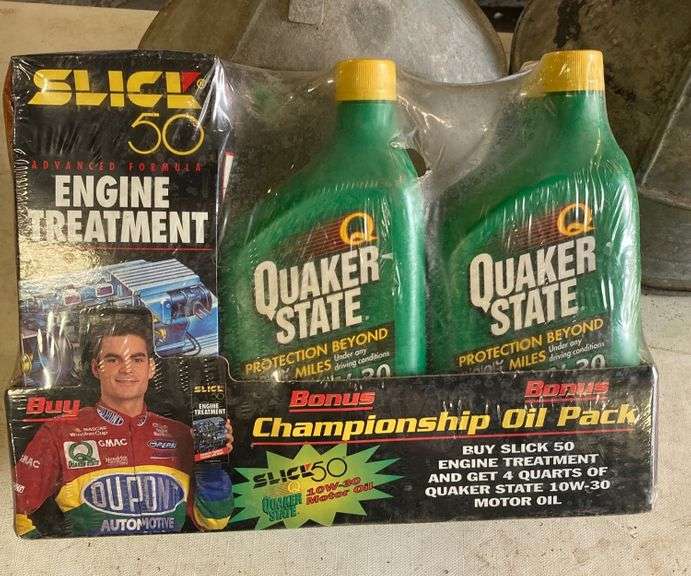 Slick 50 advanced formula engine treatment and 4 quarts of Quaker state ...
