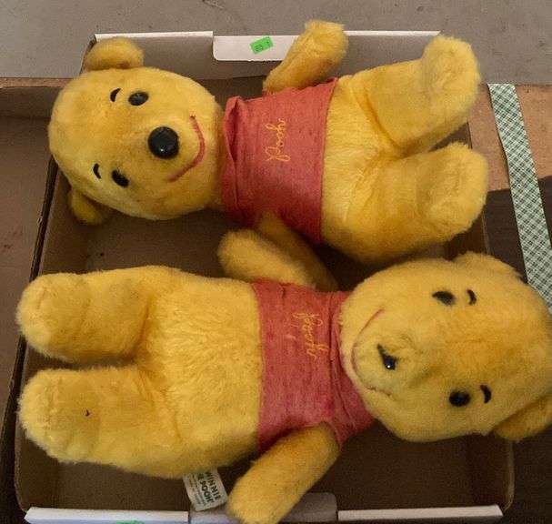 2 Stuffed Winnie the Pooh Dolls - Metzger Property Services LLC