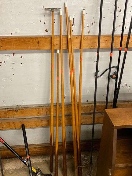 Six cue sticks and a mechanical bridge stick - Metzger Property ...