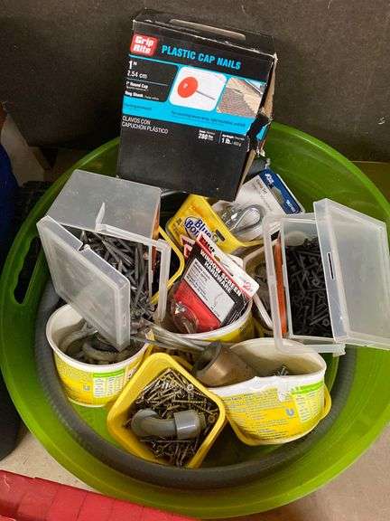 Bucket with boxes of nails and screws, plastic cap nails, window screen ...