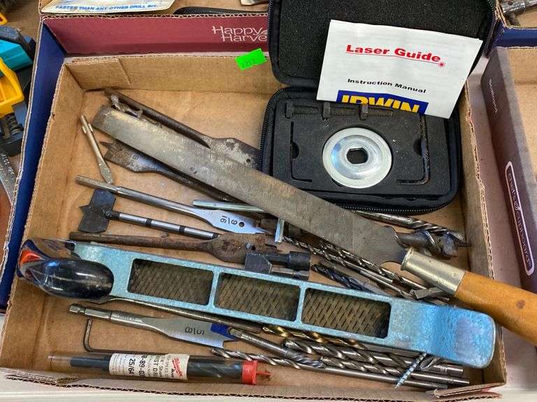 Box of drill bits, tools and a laser guide - Metzger Property Services LLC