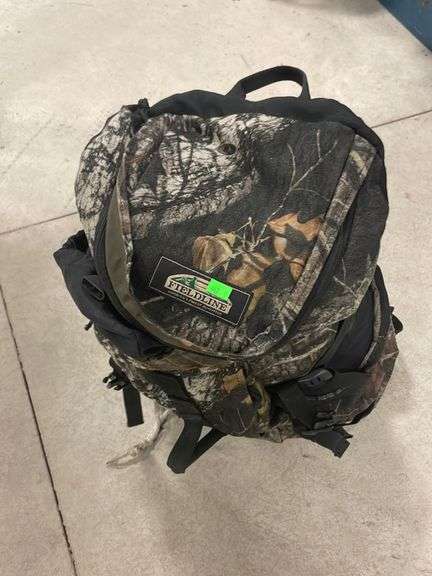 Fieldline Camo Backpack with assorted clothes inside - Metzger Property ...