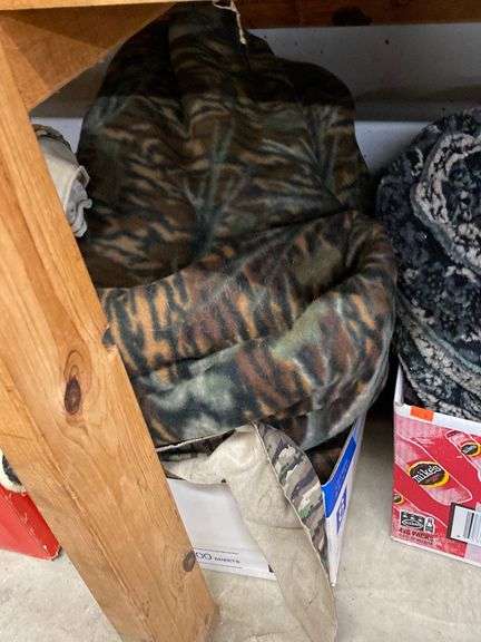 Boxes of camo blankets - Metzger Property Services LLC